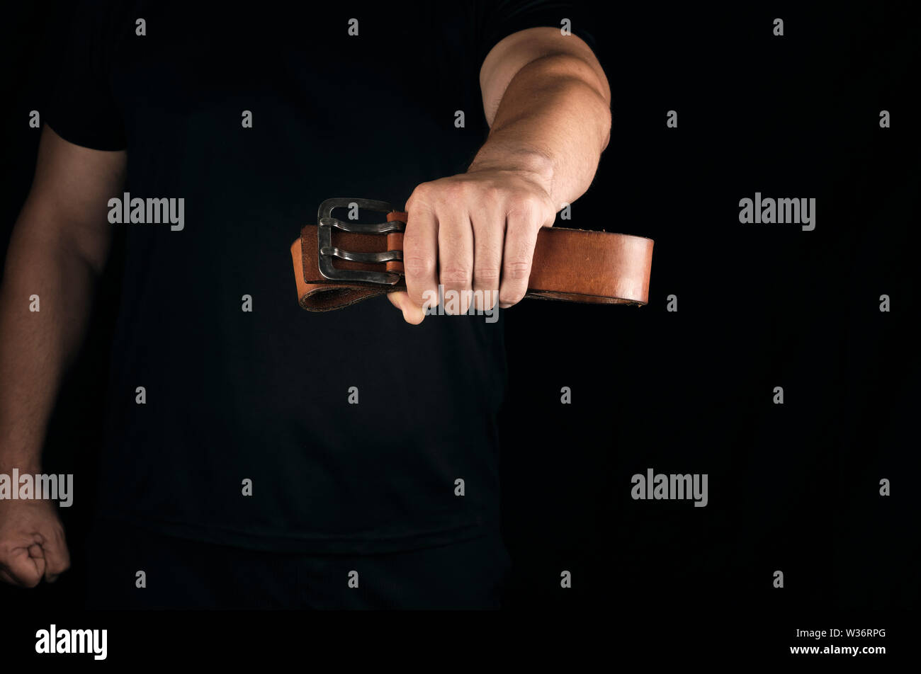 Man Holding Belt Buckle High Resolution Stock Photography and Images ...
