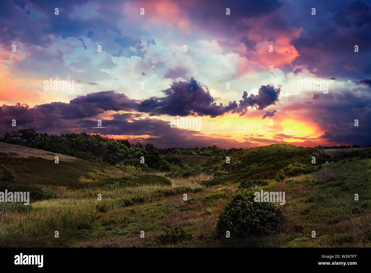 old river bed between two hills, grassy Stock Photo - Alamy
