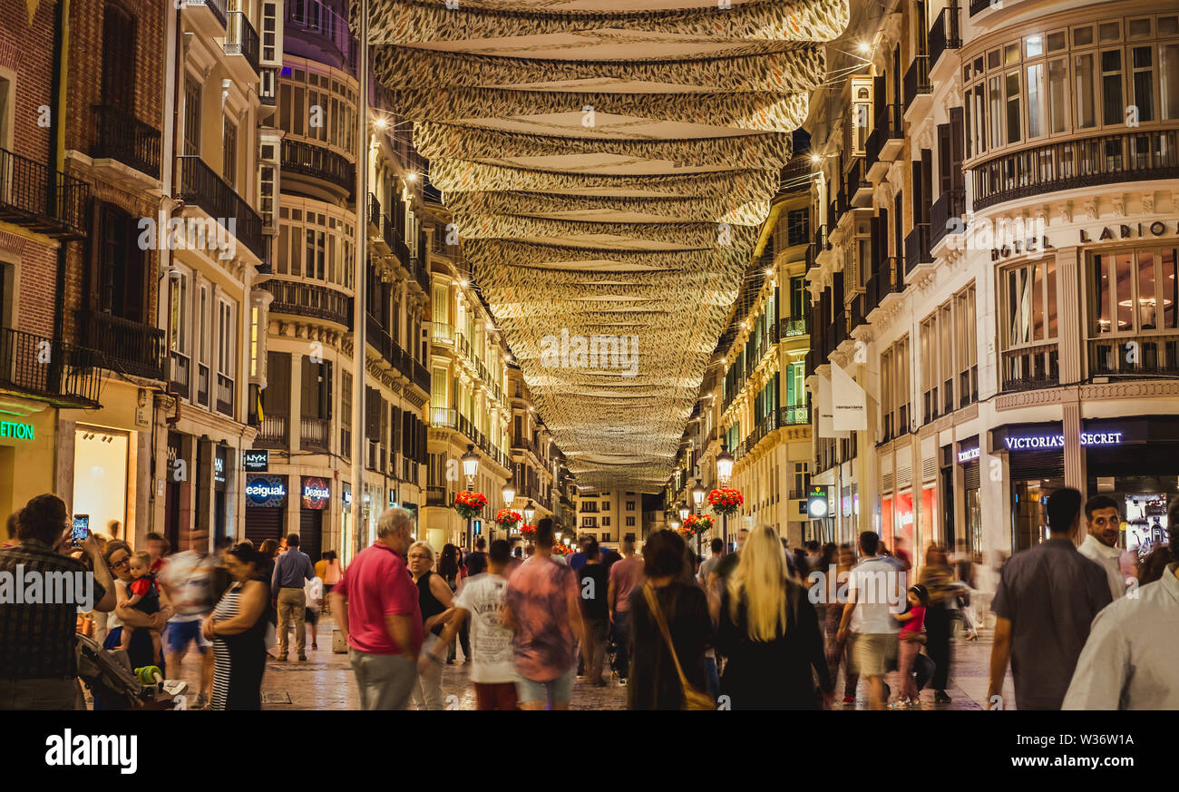 Malaga, Spain - June 22, 2018. People in motion on the Marques de ...