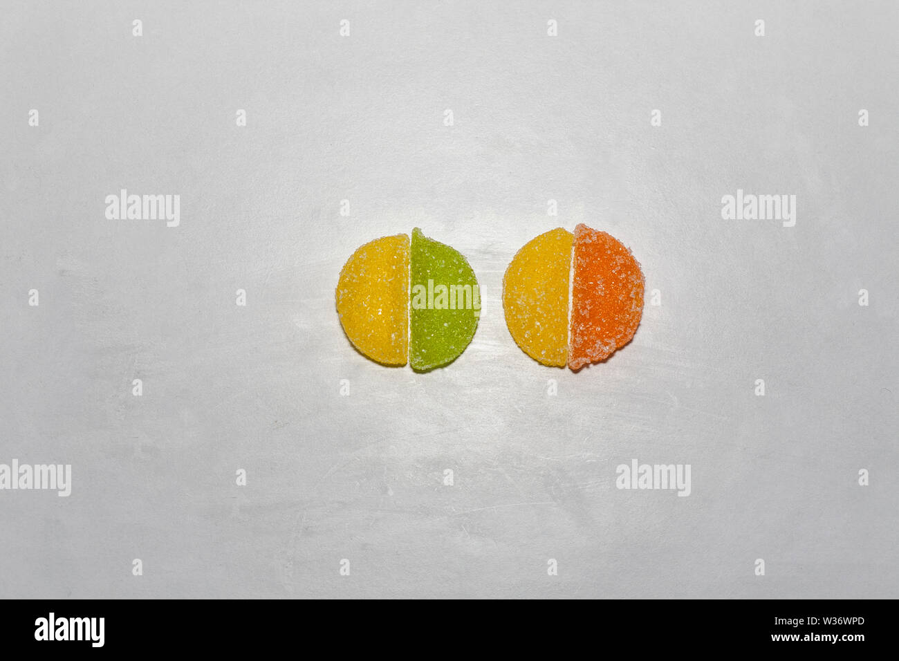 Four Sugar candies shaped as two circles Stock Photo - Alamy