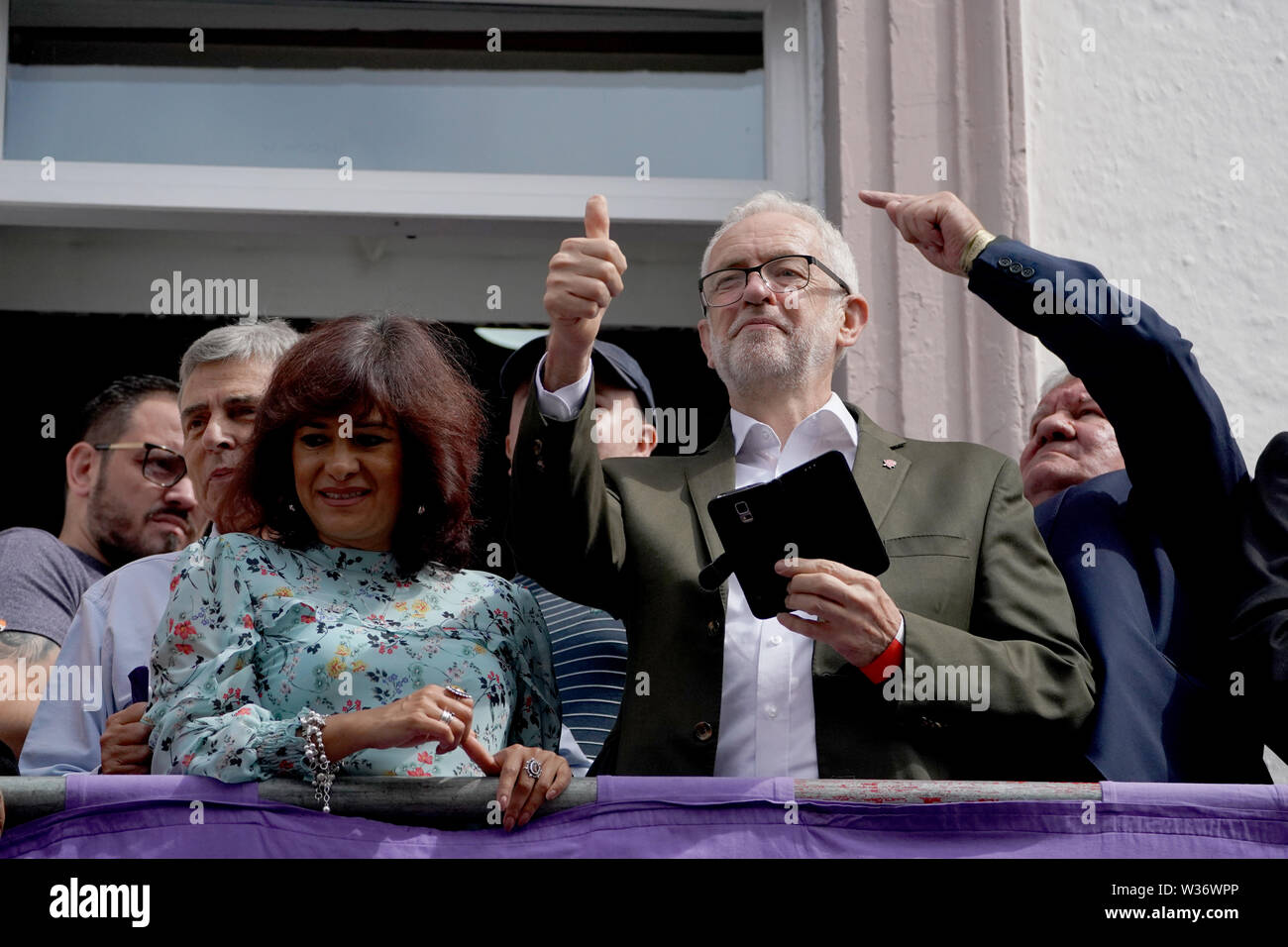Labour leader Jeremy Corbyn and his wife Laura Alvarez on the balcony ...
