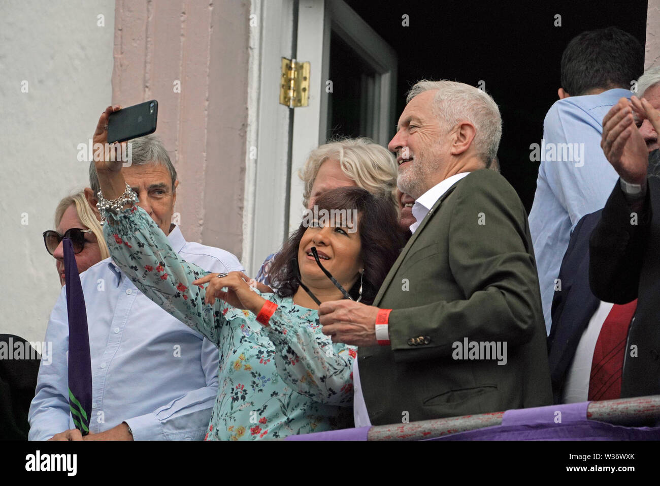 Labour leader Jeremy Corbyn and his wife Laura Alvarez on the balcony ...