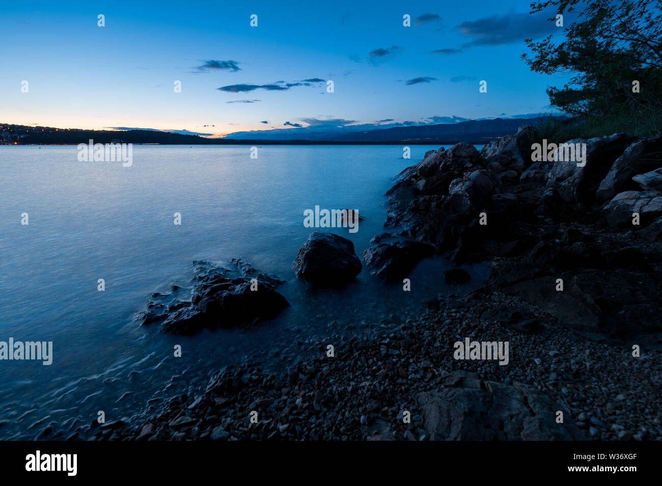 Scenic night view of the Croatian coastline, seen from a beach near ...