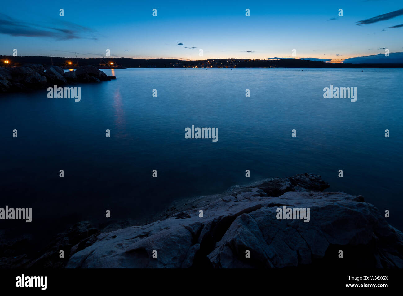 Scenic night view of the Croatian coastline, seen from a beach near ...