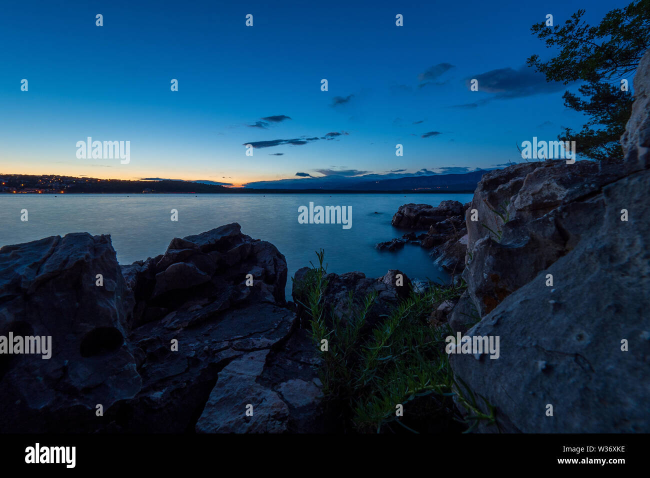 Scenic night view of the Croatian coastline, seen from a beach near ...