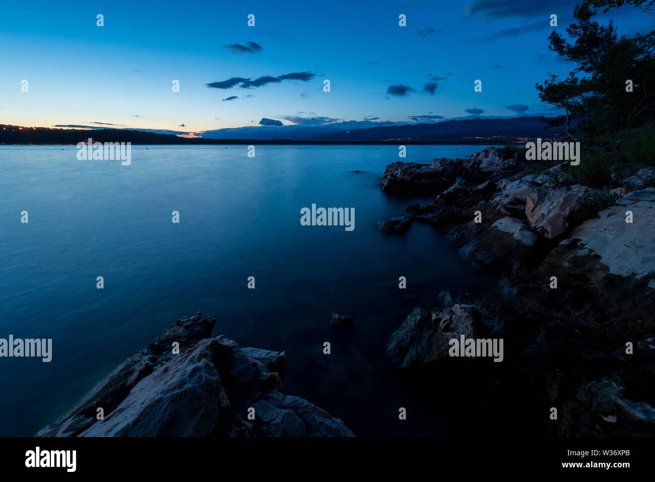 Scenic night view of the Croatian coastline, seen from a beach near ...