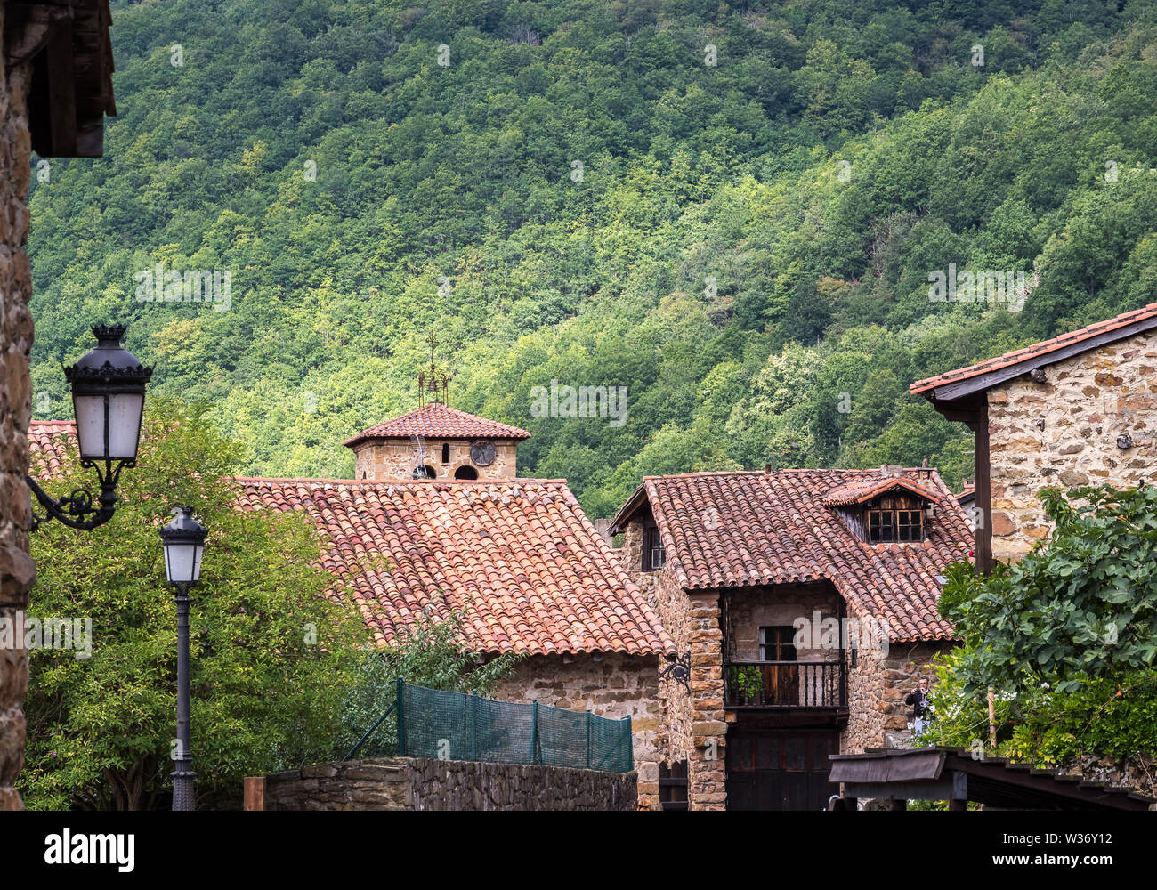Barcena Mayor, Cabuerniga valley, with typical stone houses is one of ...