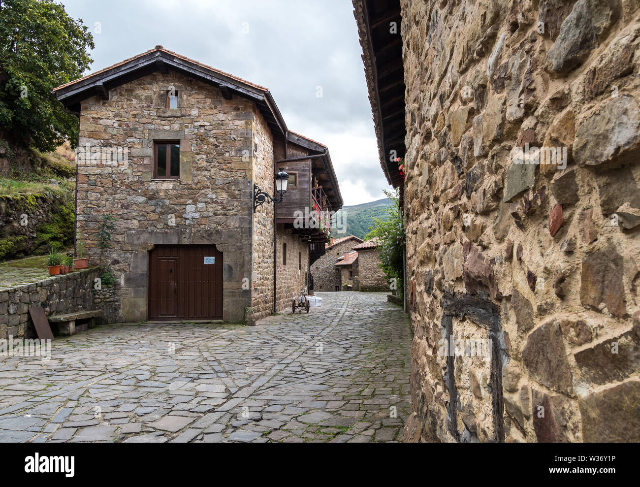 Barcena Mayor, Cabuerniga valley, with typical stone houses is one of ...