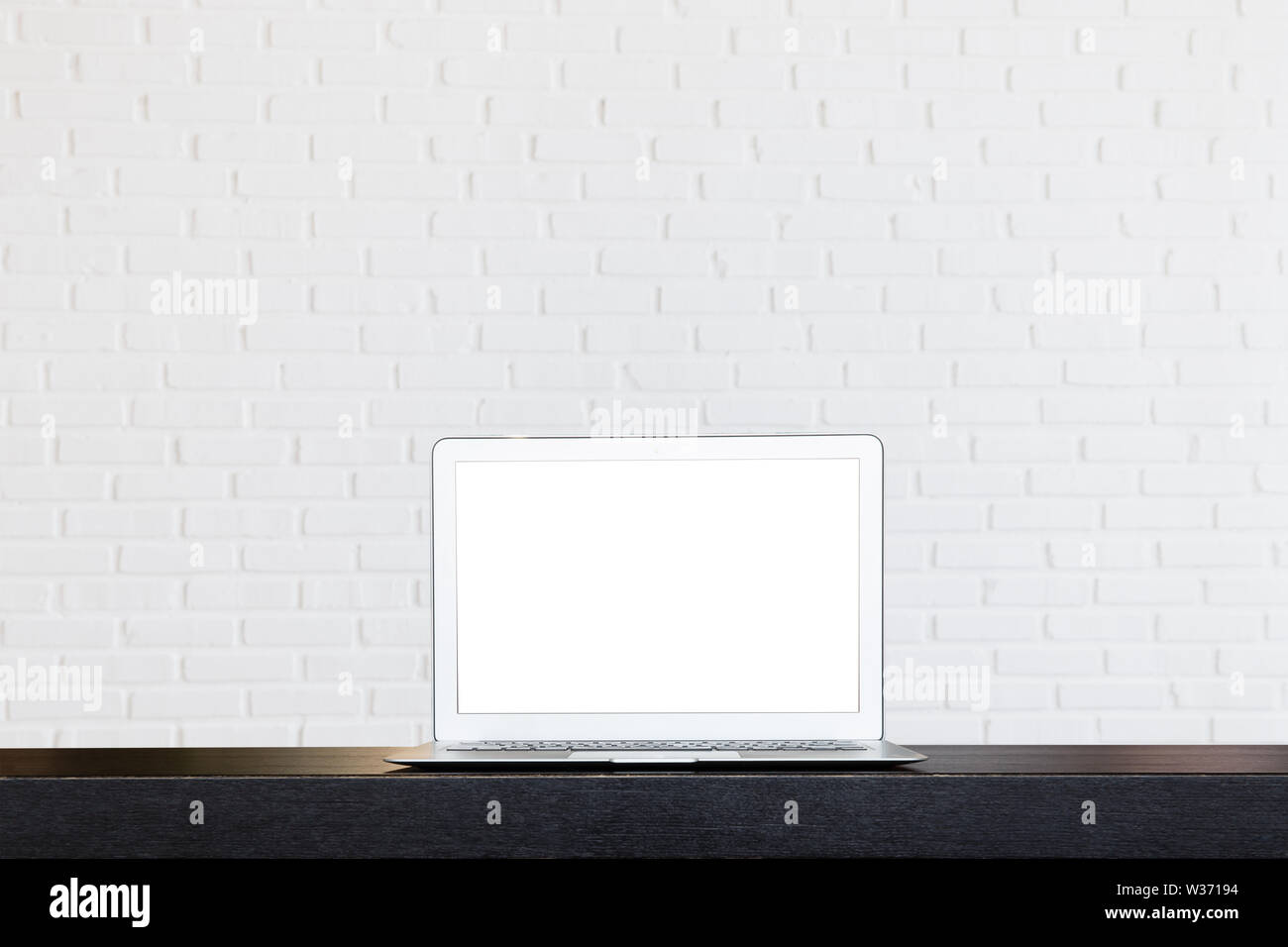 Isolated mockup image of laptop with black wood and computer with white ...