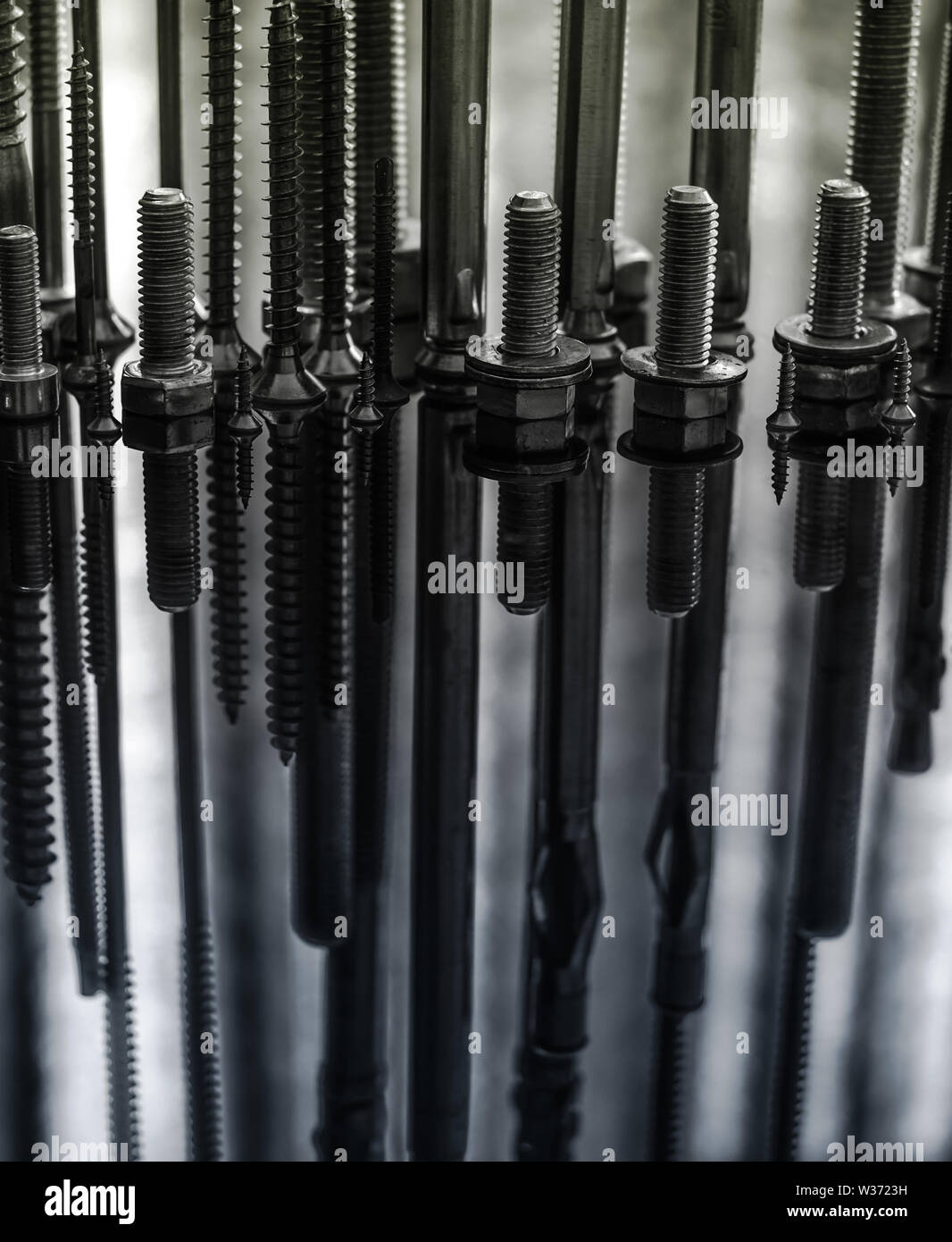 Metal bolt and screw close-up with reflection Stock Photo - Alamy