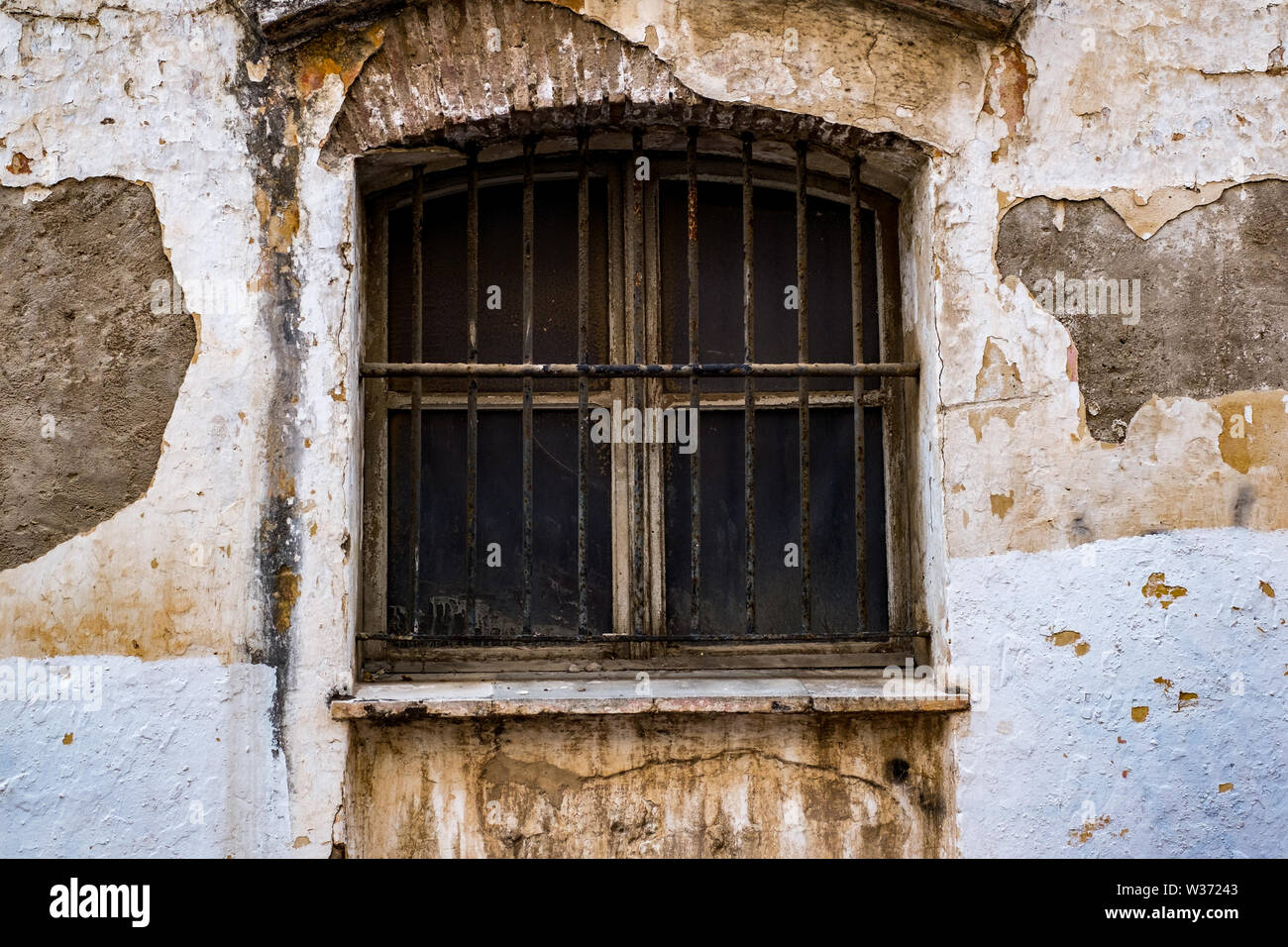 old dusty window with rusty bars Stock Photo - Alamy