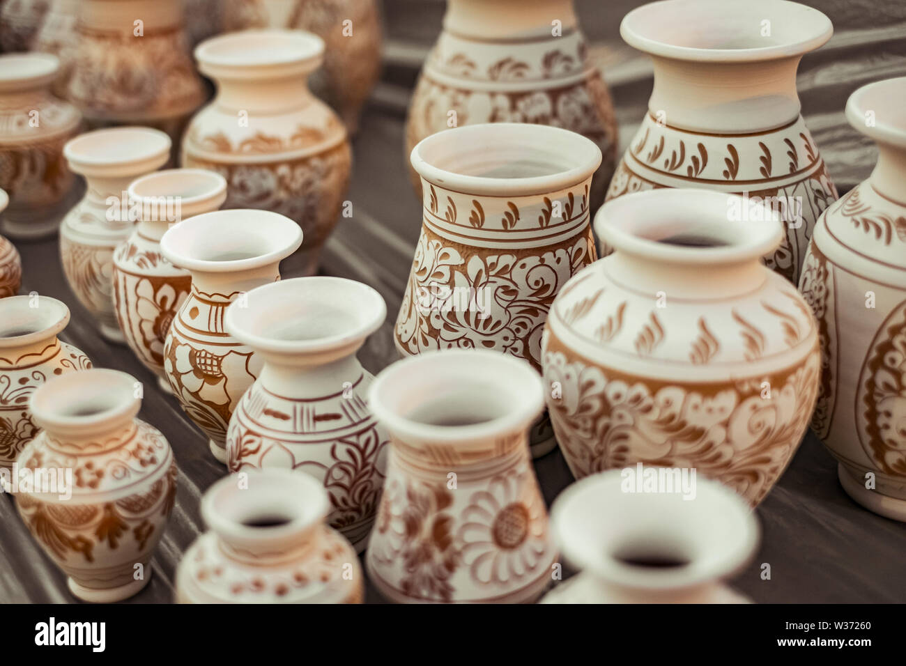 Romanian traditional ceramic vases on the pavement Stock Photo - Alamy