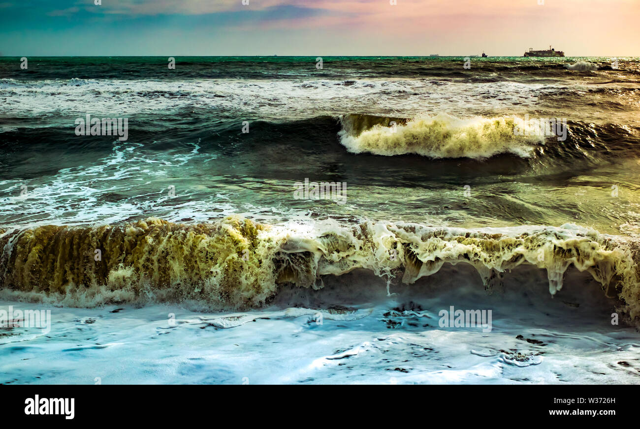 waves on the mediteranean sea on a Malaga beach, Spain Stock Photo - Alamy