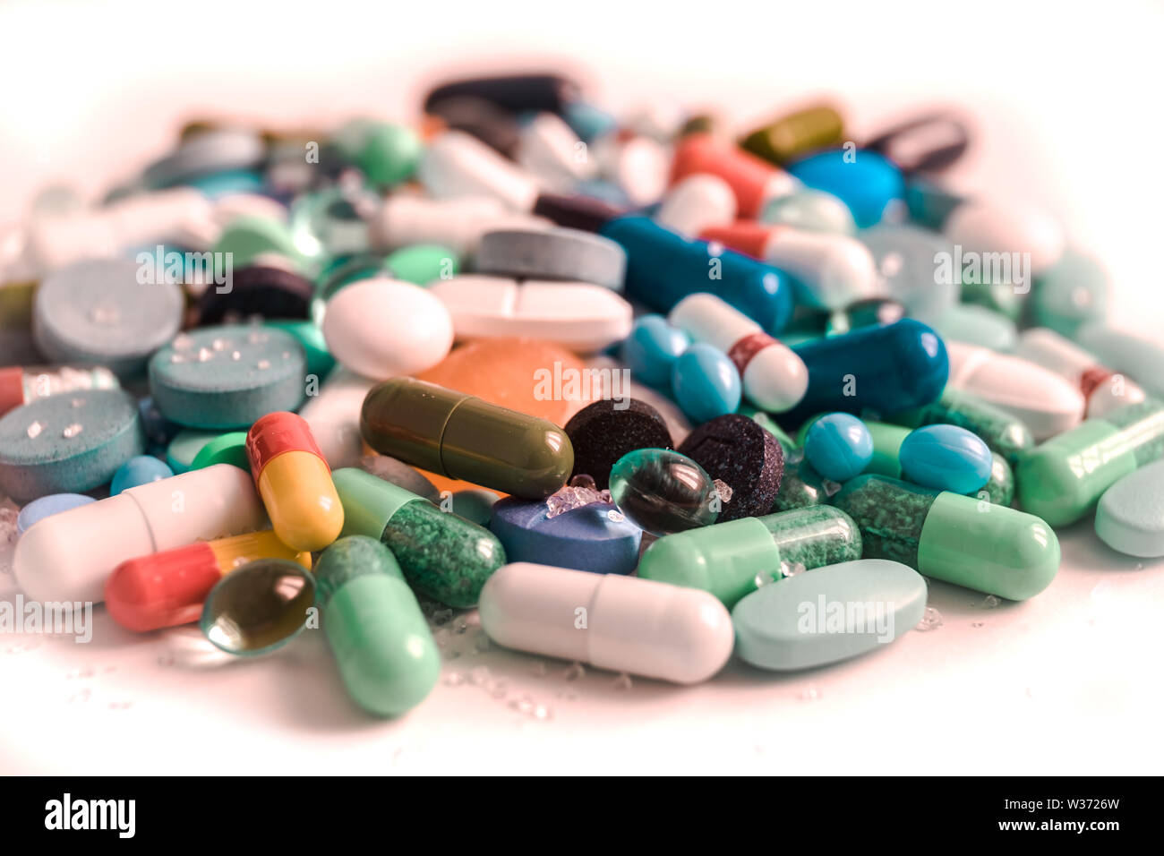 Pharmaceutical tablets, capsules, therapy drugs and pills on white ...