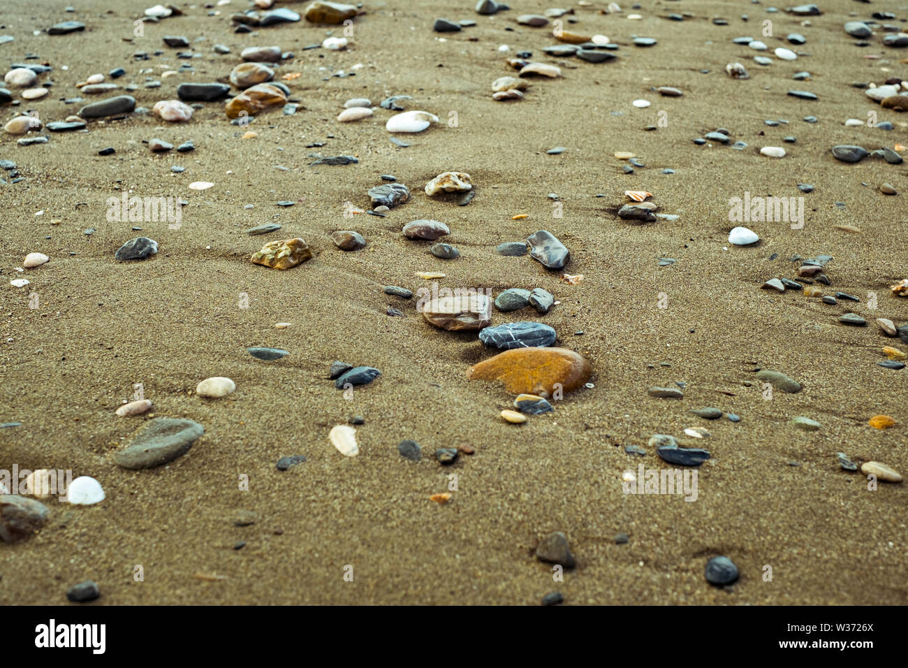 Stones on the beach Stock Photo - Alamy