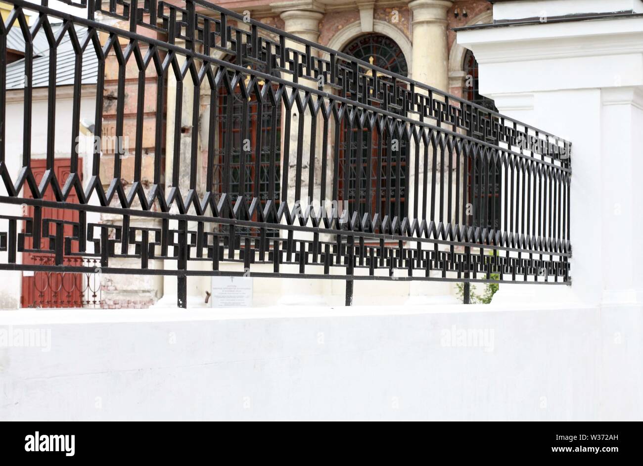 fence of church at day Stock Photo - Alamy
