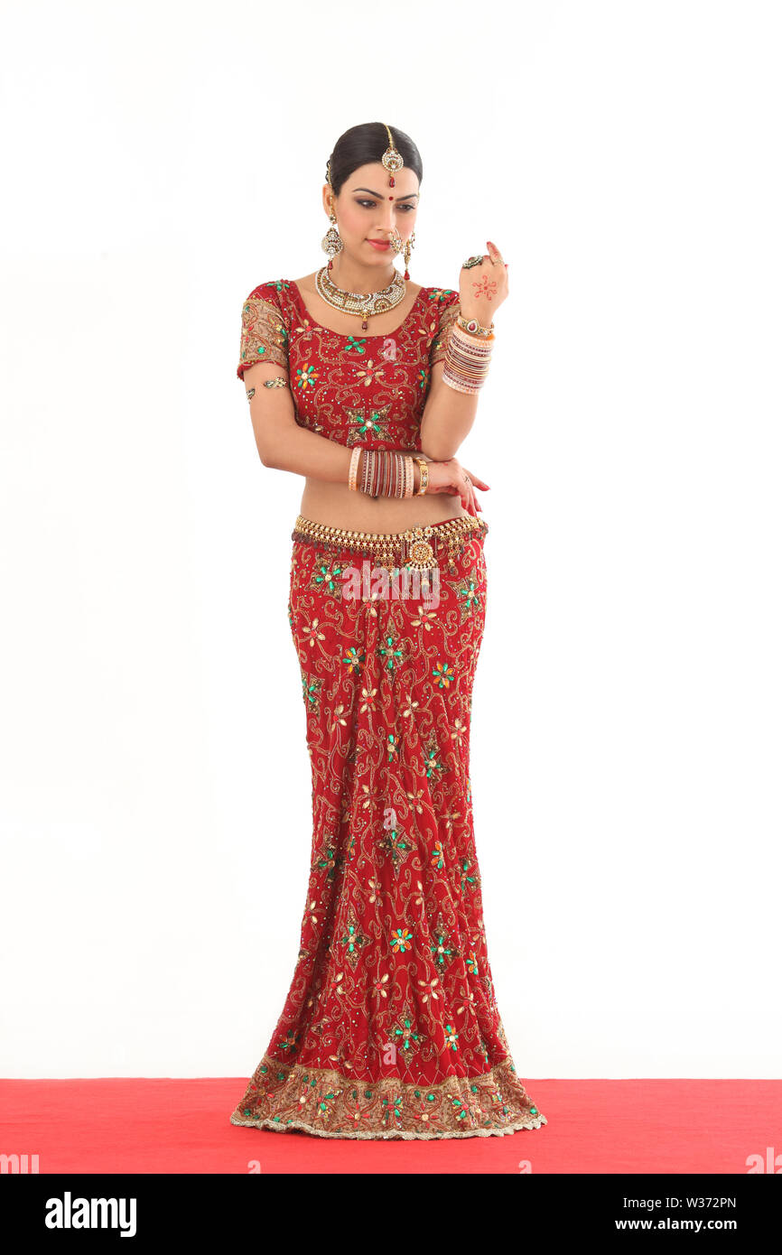 Indian bride standing Stock Photo - Alamy