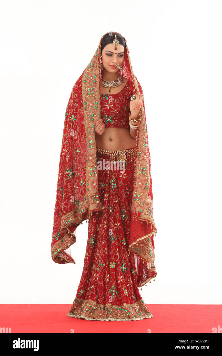 Indian bride standing Stock Photo - Alamy