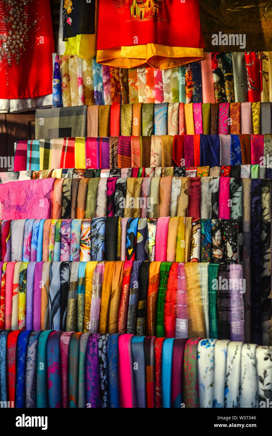 Colorful textile for sale at street market in Hoi An, Vietnam Stock ...