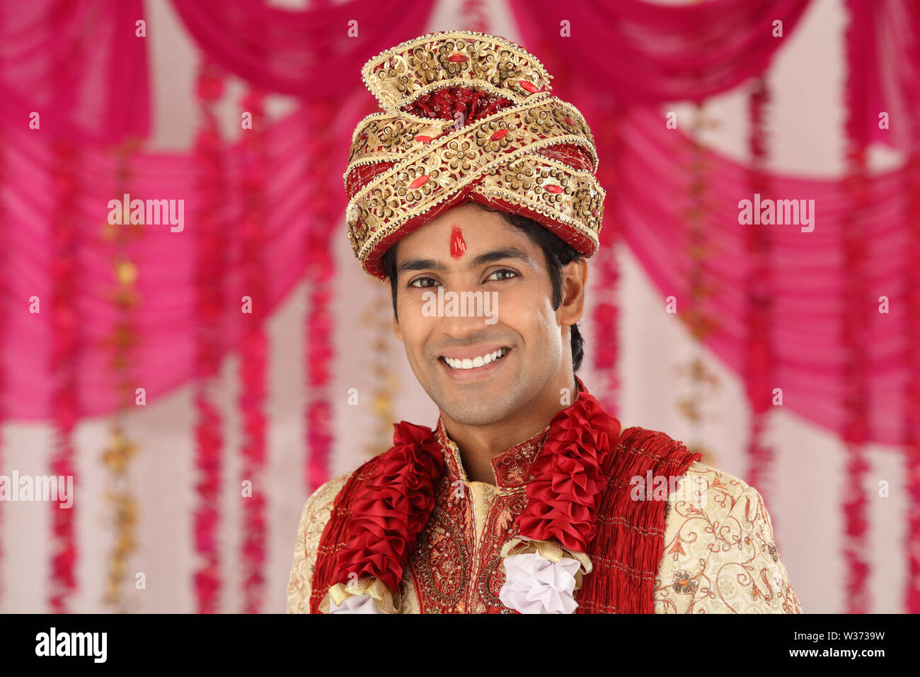 Happy handsome indian groom wedding hi-res stock photography and images ...