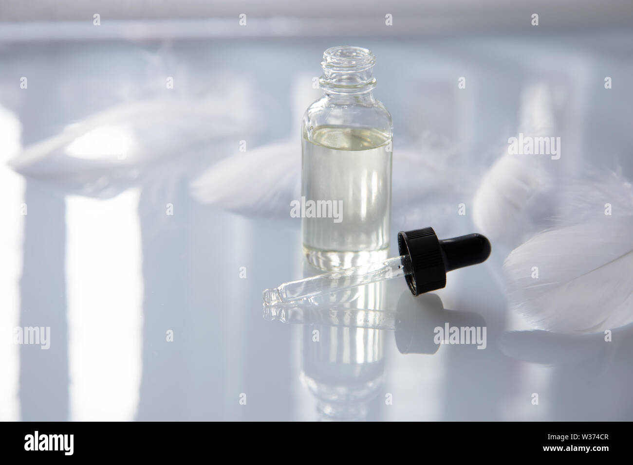 Dropper glass bottle with pipette. Mock up Essential liquid Stock Photo ...