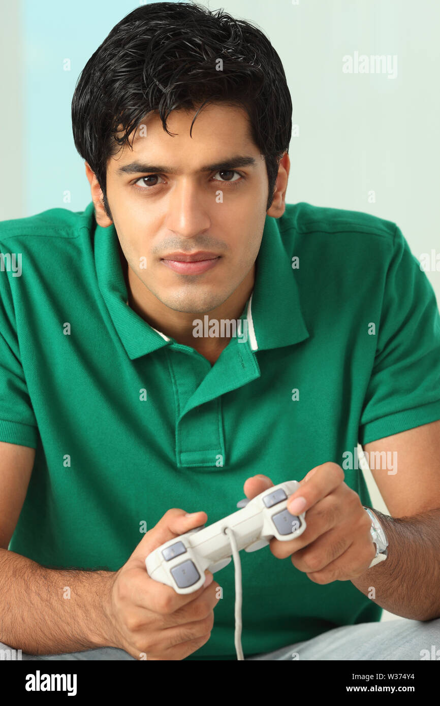 Man playing video game Stock Photo - Alamy