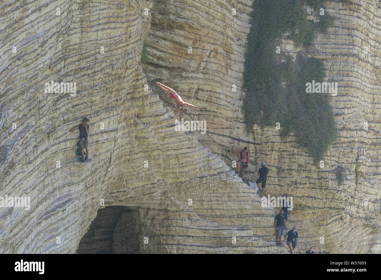 Beirut, Lebanon. 13th July 2019. A competitor jumps off 'The Pigeon ...