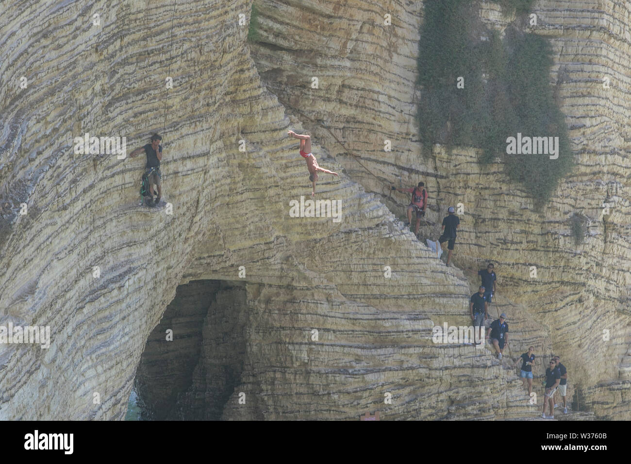 Beirut, Lebanon. 13th July 2019. A competitor jumps off 'The Pigeon ...