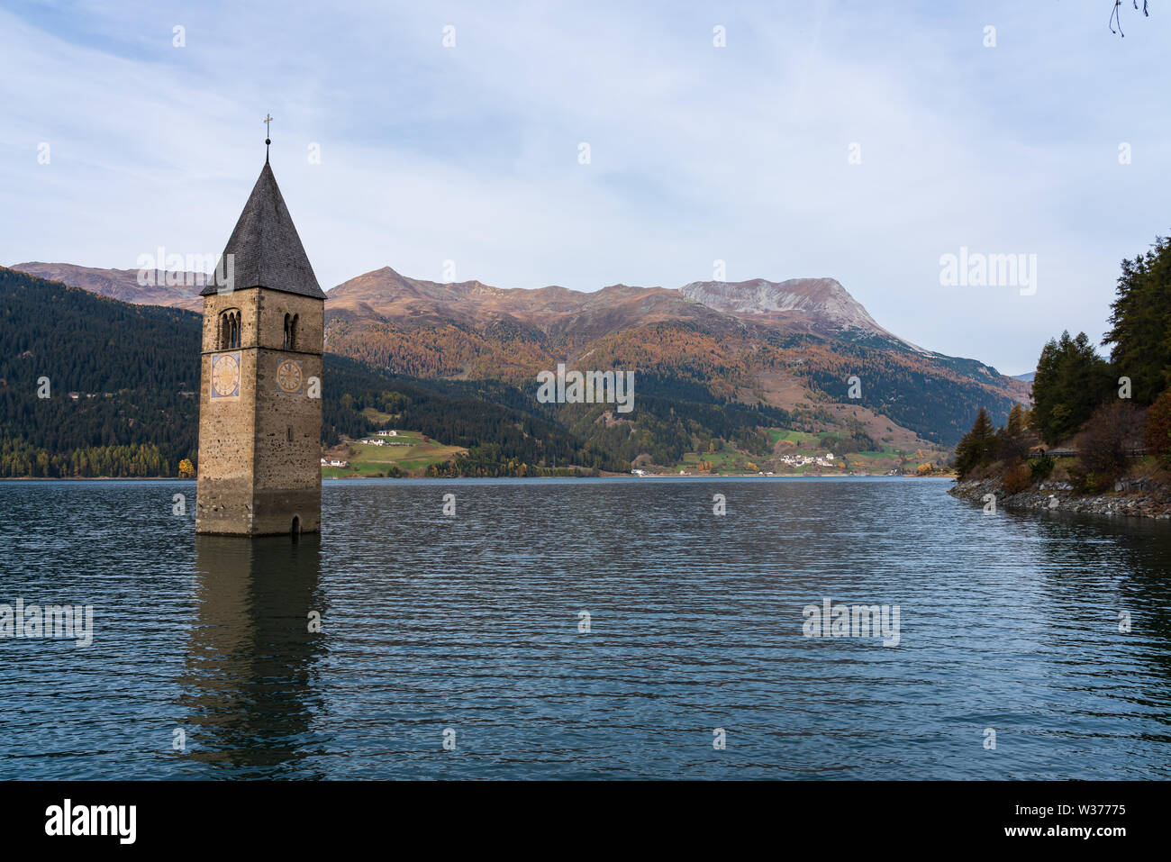 The famous bell tower in the Lake of Reschen - Lago di Resia in South ...