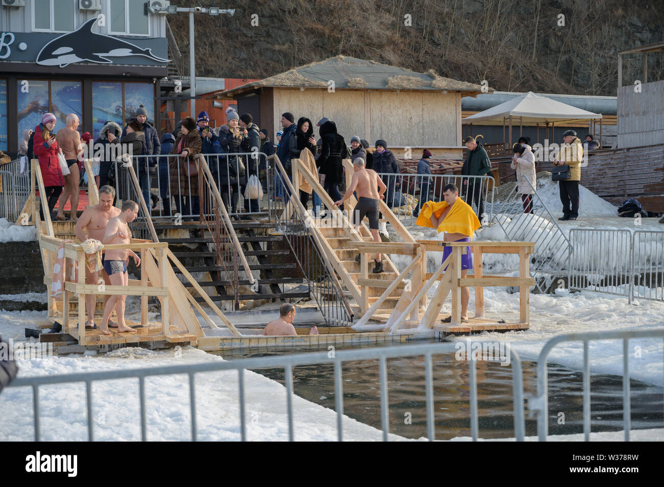 VLADIVOSTOK, RUSSIA - JANUARY 19, 2019: Epiphany bathing - people ...