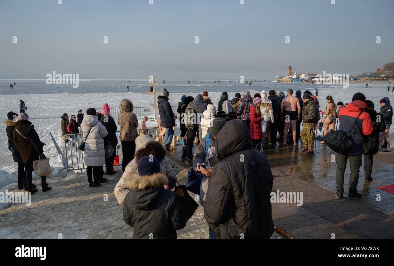VLADIVOSTOK, RUSSIA - JANUARY 19, 2019: Epiphany bathing - people ...