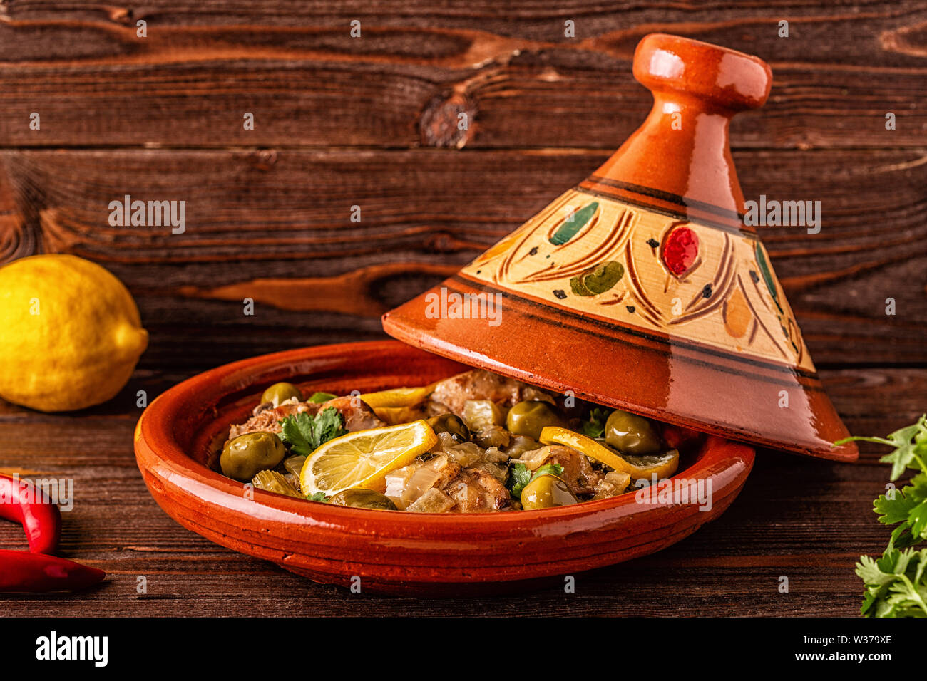 Traditional Moroccan chicken tagine with olives and salted lemons ...