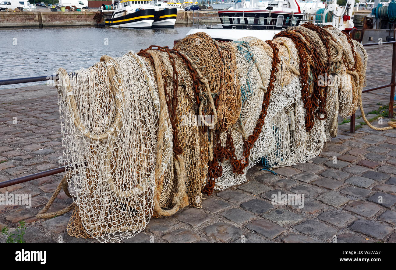 Fishing nets drying over railing hi-res stock photography and images ...