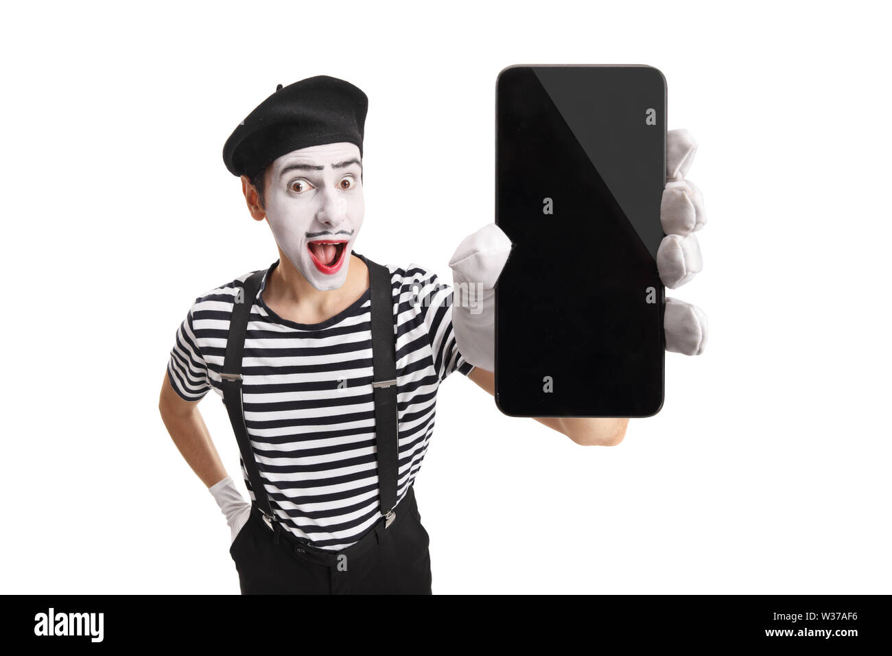 Excited mime showing a mobile phone isolated on white background Stock ...