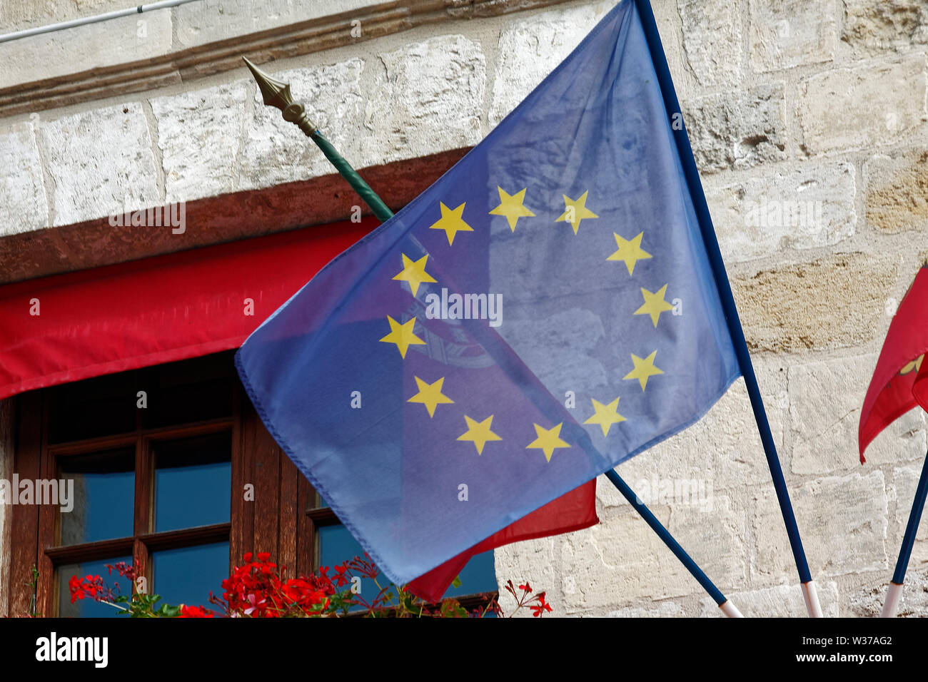 European Union flag flying, blue, gold stars, EU, France, summer ...