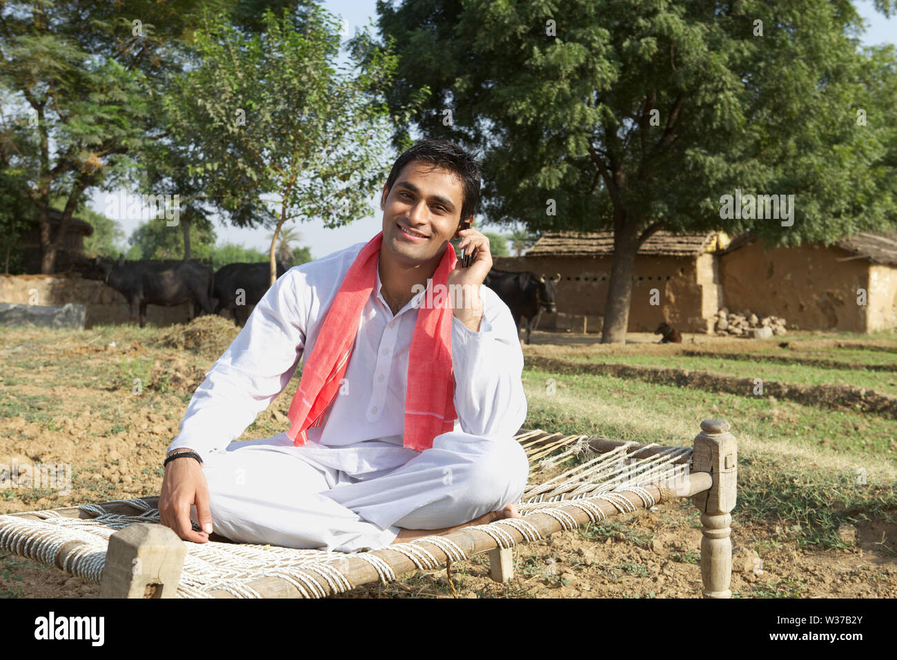 Villager cell phone hi-res stock photography and images - Alamy