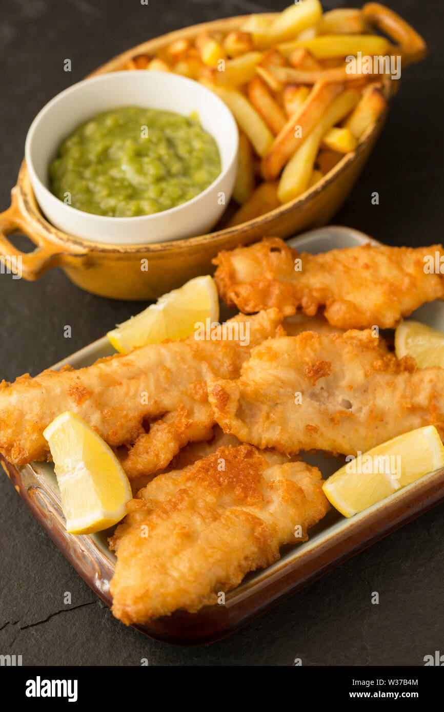 Fillets of deep fried pouting, Trisopterus luscus, that have been ...