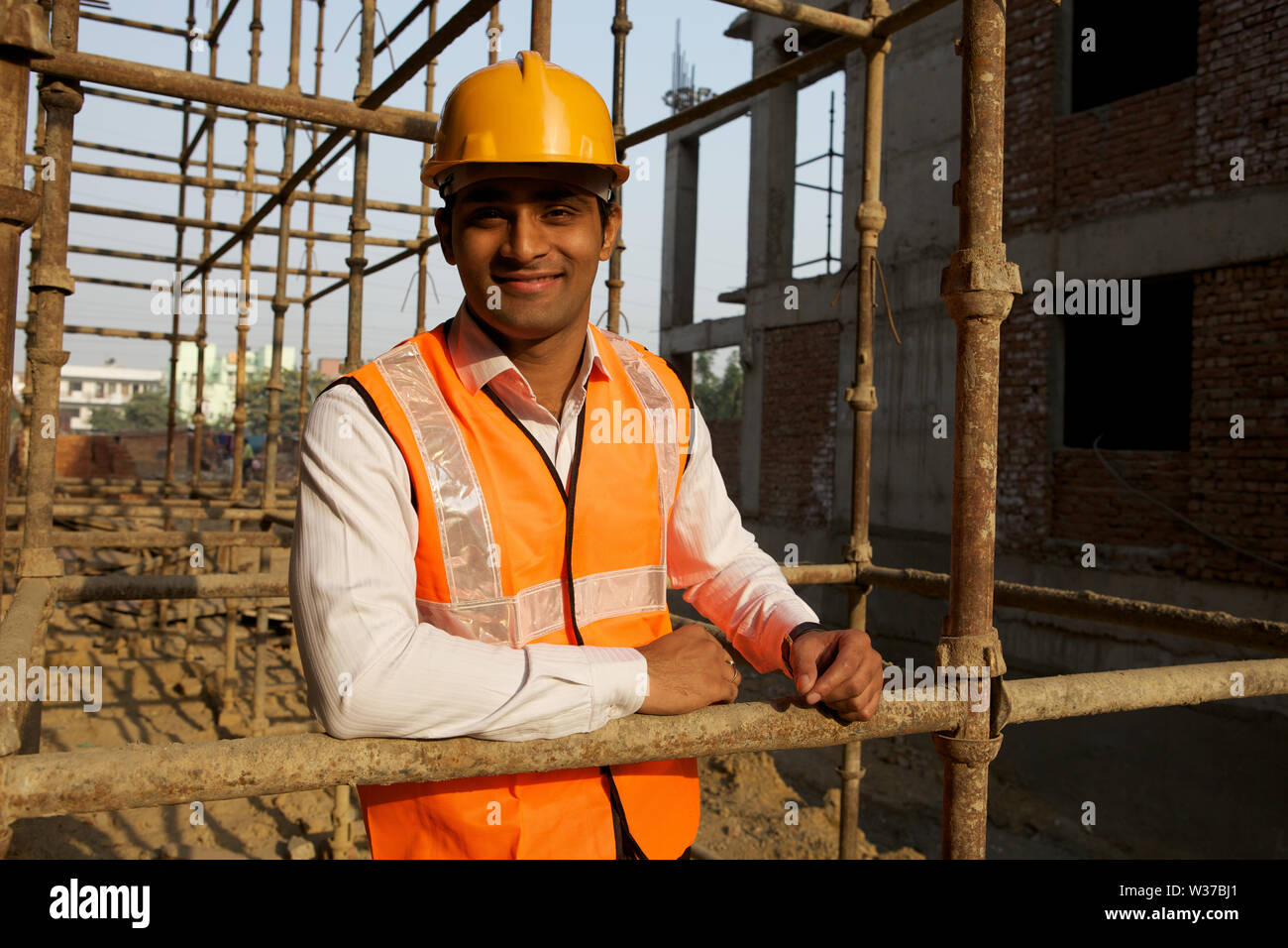 Architect at construction site Stock Photo - Alamy