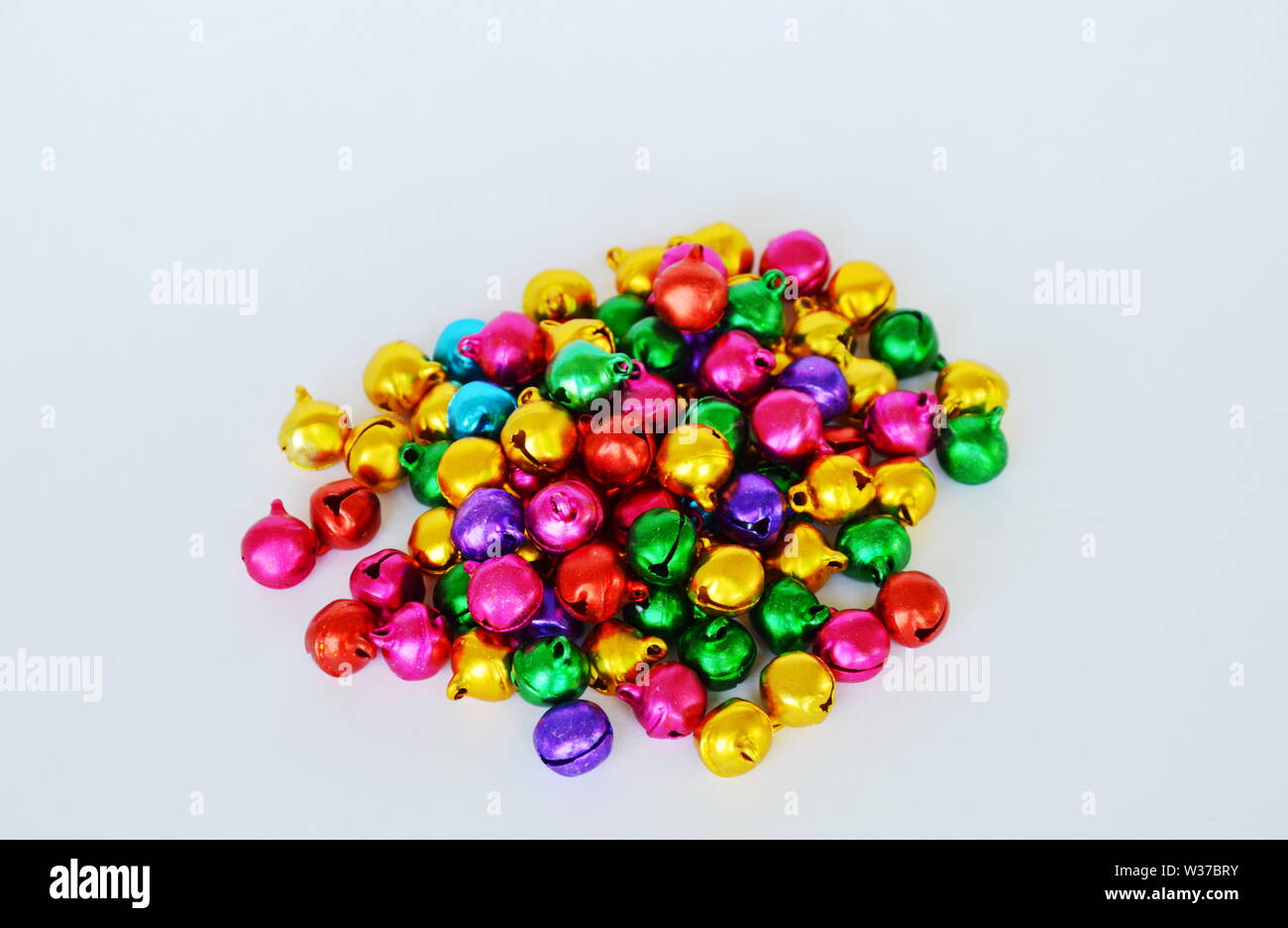 colorful bell on white background Stock Photo - Alamy