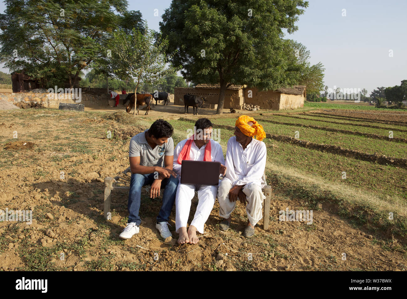 Indian farmer sitting laptop hi-res stock photography and images - Alamy