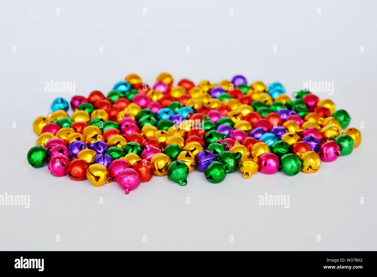 colorful bell on white background Stock Photo - Alamy