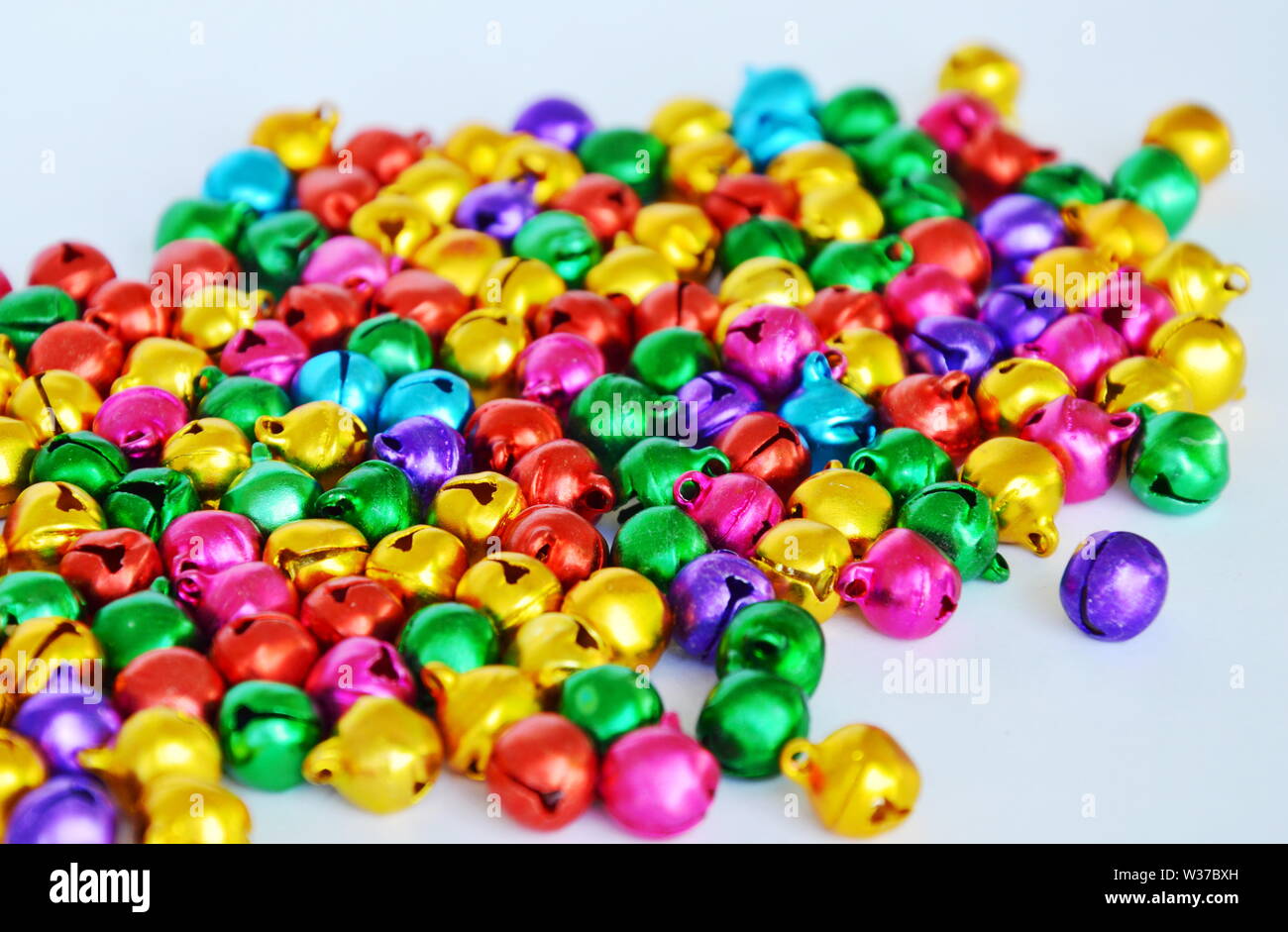 colorful bell on white background Stock Photo - Alamy
