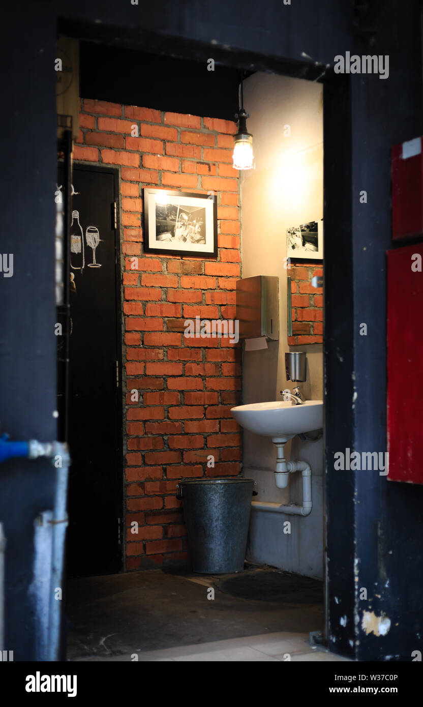 Singapore-06 NOV 2018:vintage raw theme style restroom inside view ...