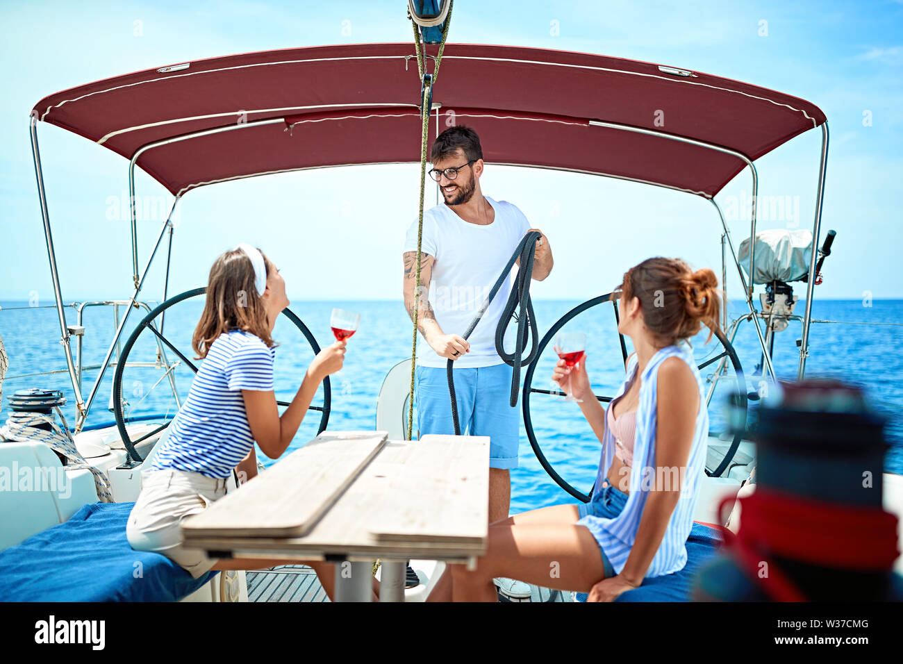 Young people resting on sailing hi-res stock photography and images - Alamy