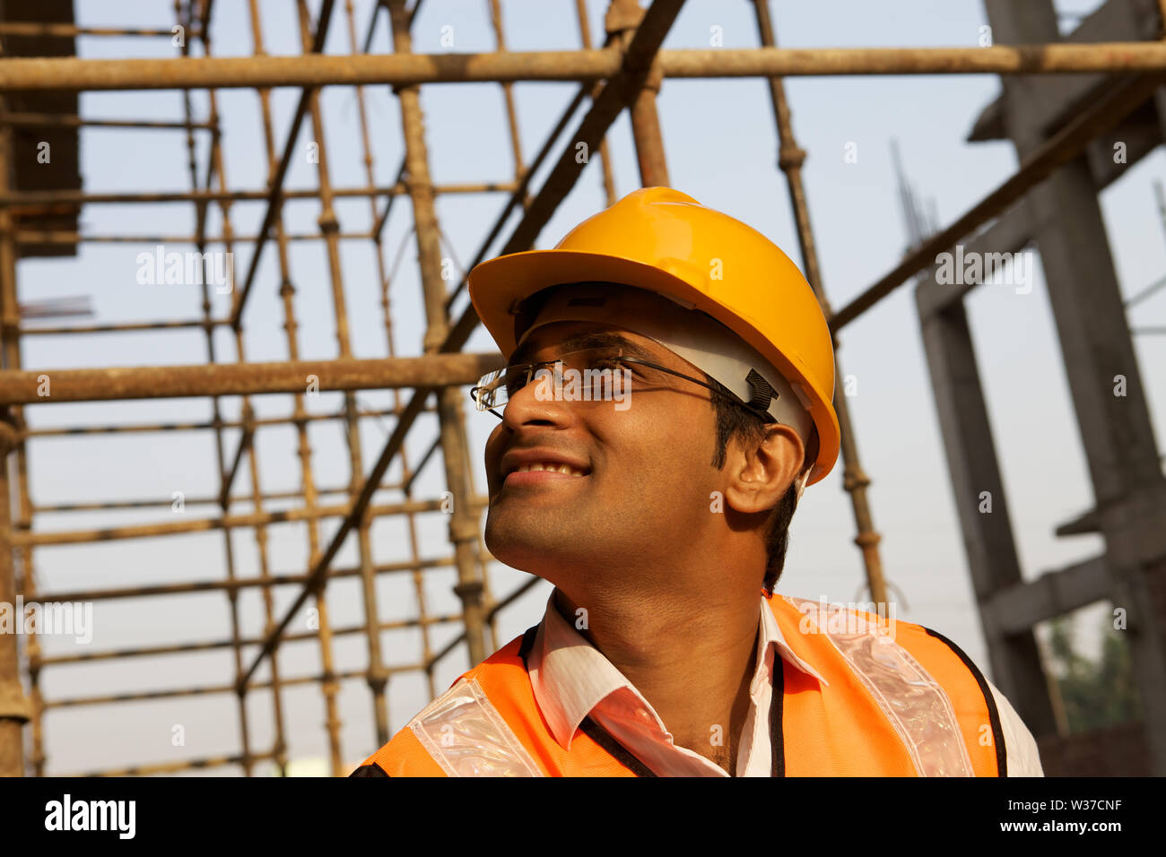 Architect at construction site Stock Photo - Alamy