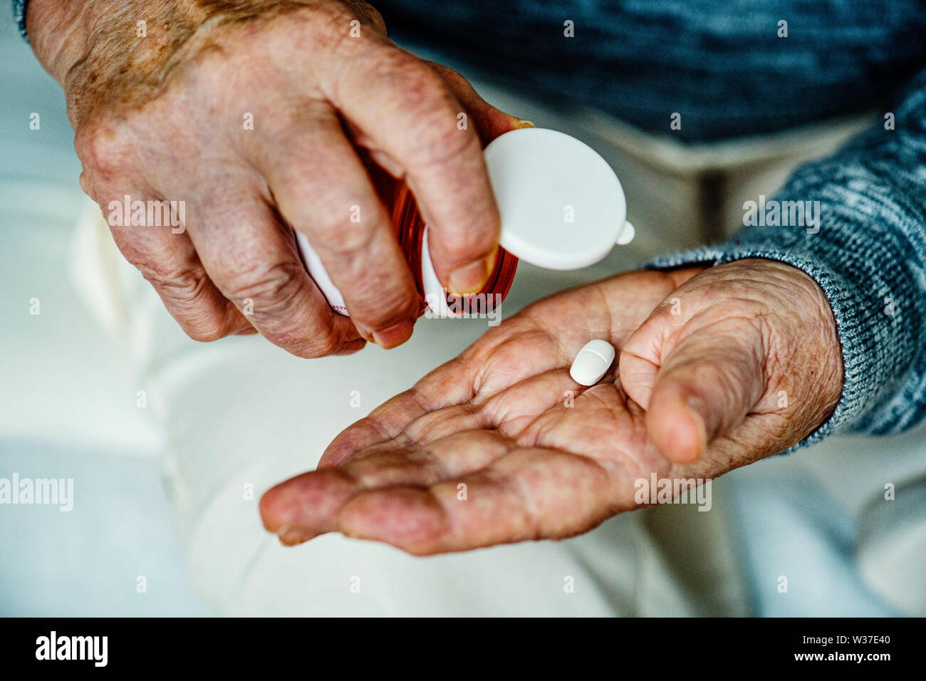 taking a tablet Stock Photo - Alamy