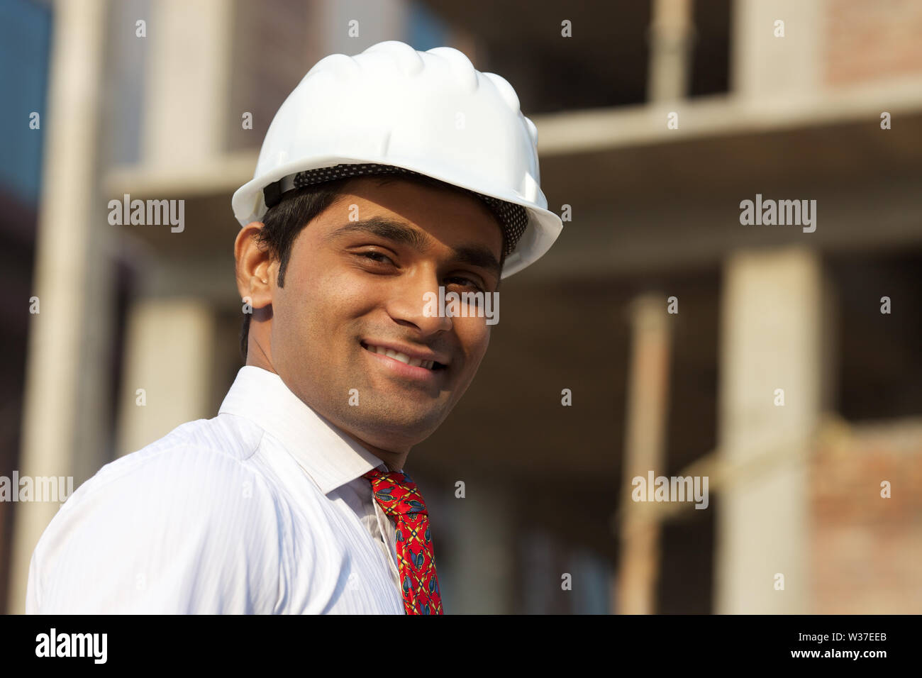 Architect at construction site Stock Photo - Alamy