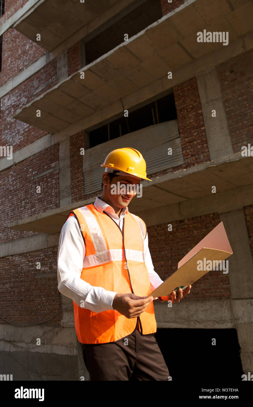 Architect doing paperwork Stock Photo - Alamy