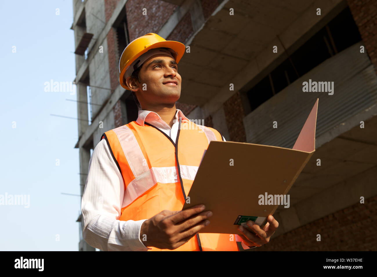 Architect doing paperwork Stock Photo - Alamy