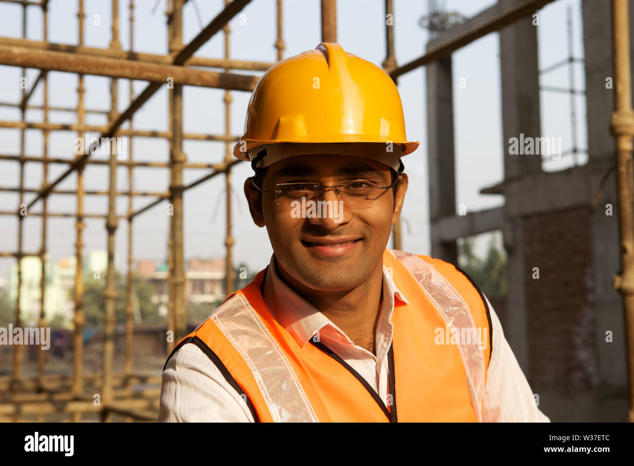 Architect at construction site Stock Photo - Alamy